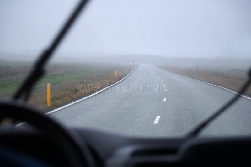 Driving a Car in the Rain with Activated Windshield Wipers Stock Image ...