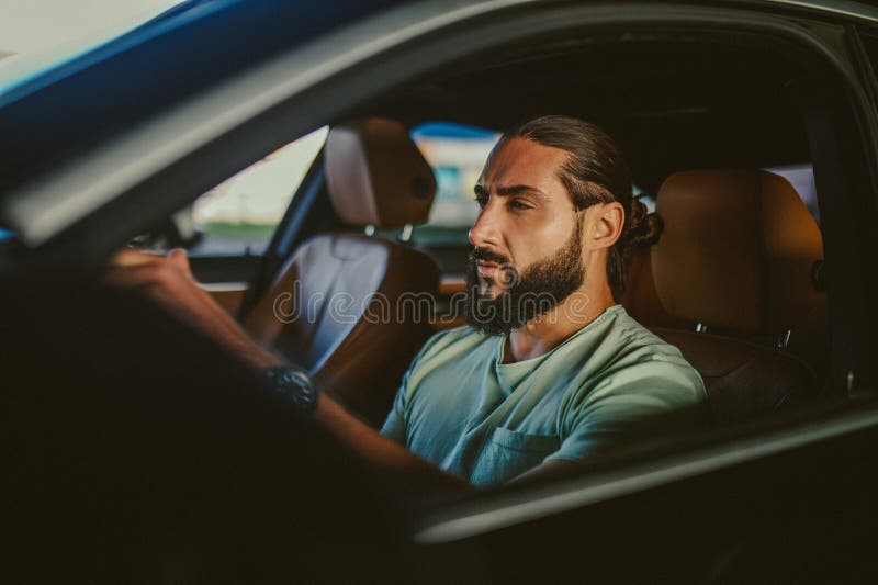 Young Handsome Dark-haired Man Driving a Car Stock Image - Image of ...