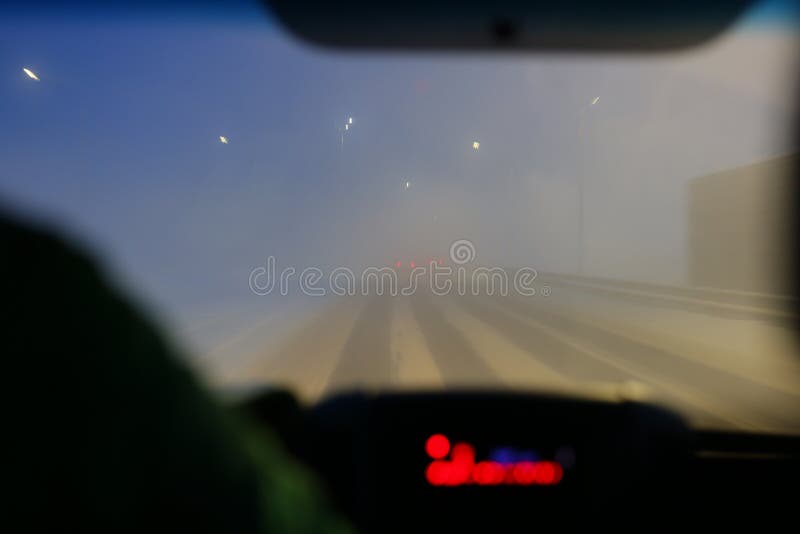 Driving through a Challenging Snowstorm Blurred Vision, Harsh ...