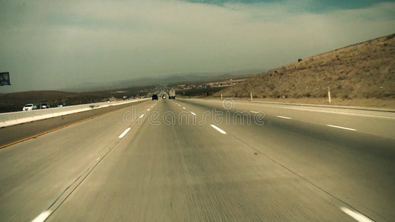 Driving Down Highway Looking Back with Traffic Stock Footage - Video of ...
