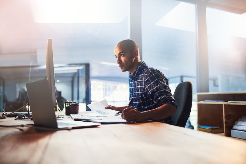 Driving Efficiency into His Performance. a Young Designer Working in ...