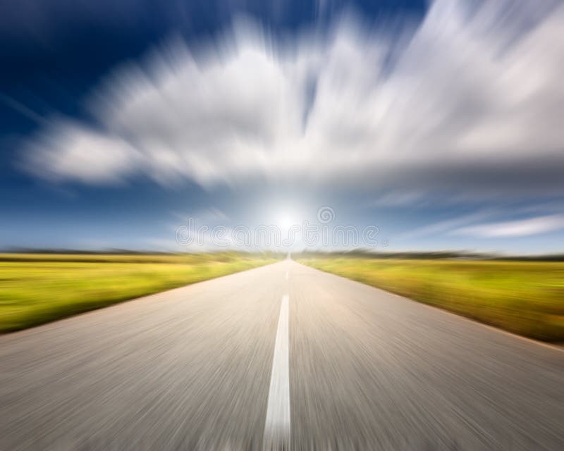 Blurred Road Towards the Setting Sun Stock Image - Image of blur ...