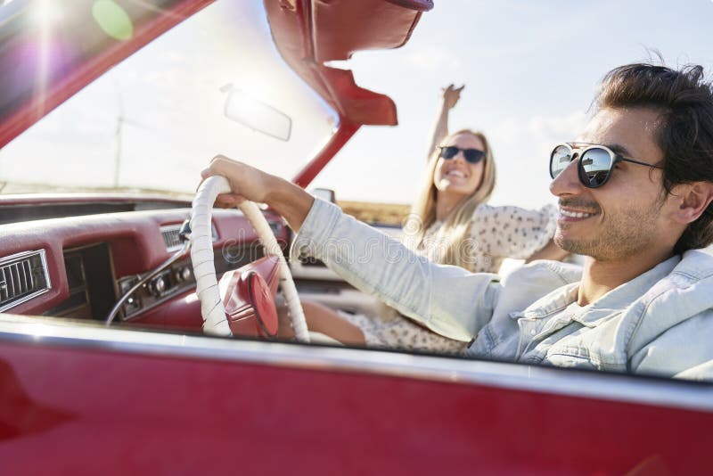 Driving Freedom in Red Convertible Stock Photo - Image of friendship ...