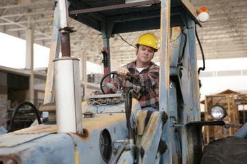 Driving Heavy Equipment stock image. Image of earthmover - 1394657