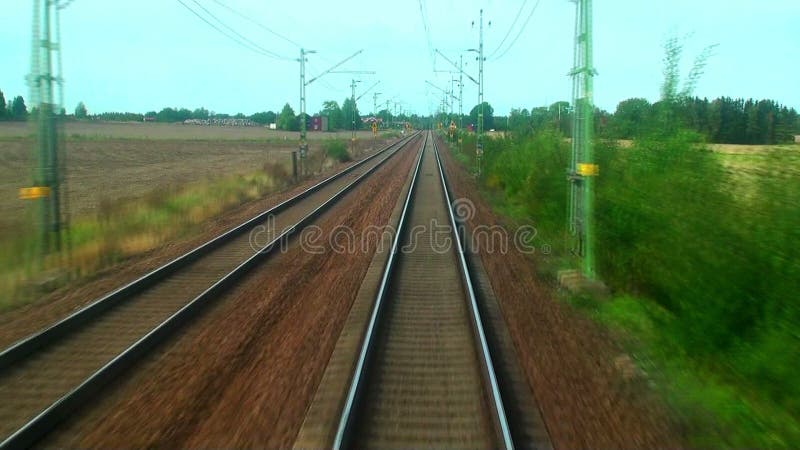 High Speed Train Passing through English Village Stock Video - Video of ...