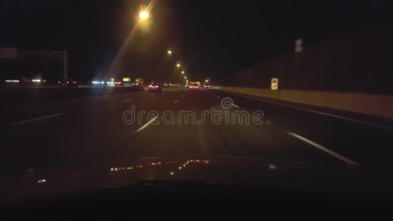 Driving on Highway on-Ramp at Night. Driver Point of View POV Stock ...