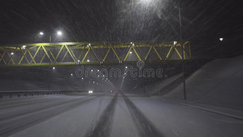Highway with Snow Mountain Background and Snowfall with Clear Sky Stock ...