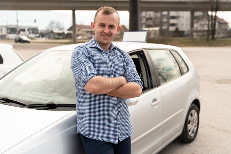 Driving Instructor Leaning on His Car Stock Image - Image of adult ...