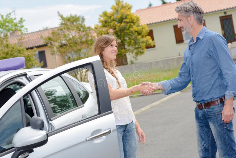 Driving Instructor and Student Shaking Hands Stock Image - Image of ...