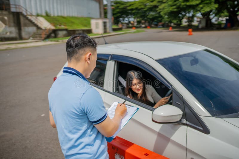 Driving Lesson in Progress the Instructor is Evaluating the Student ...