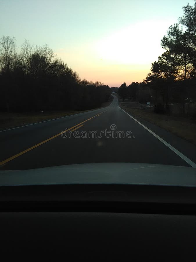 Driving stock image. Image of horizon, dusk, evening - 84679033