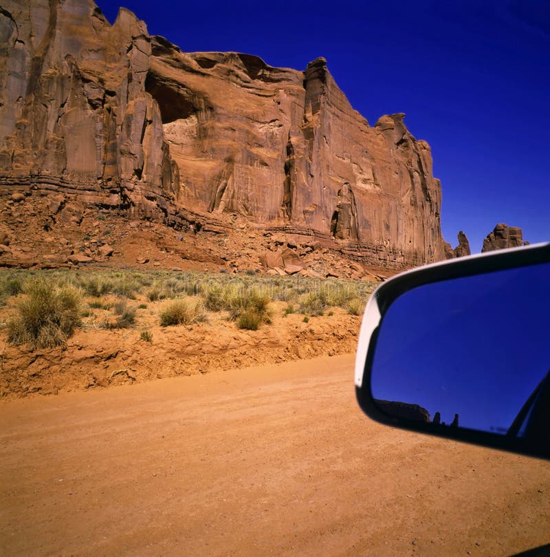 Car Driving Through Monument Valley Arizona/Utah Stock Photo - Image of ...