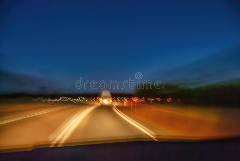 Driving at Night on a Long Road, Fast Motion Blurred Movements Stock ...