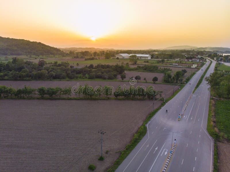 Highway Sunrise Car Driving Sun Open Road Aerial View Stock Photos ...