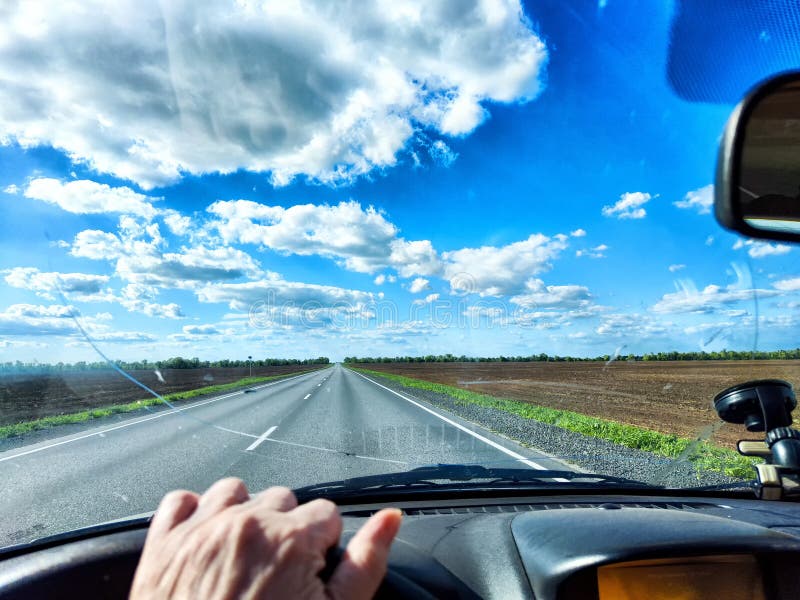 Driving on an Open Road with a Cracked Windshield and a Scenic View of ...