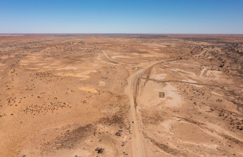Driving through the Outback Desert. Stock Photo - Image of unsealed ...