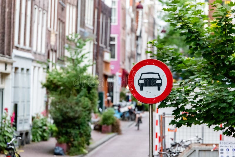 Driving through is Prohibited Sign on Road with Blurry Background Stock ...