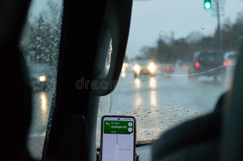 Driving in the rain stock image. Image of communication - 270392939