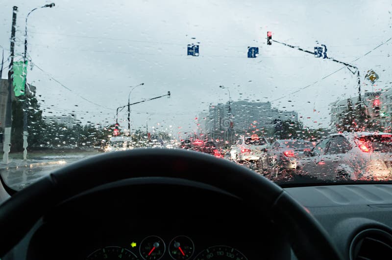 Driving in the rain stock photo. Image of steering, driving - 33391618