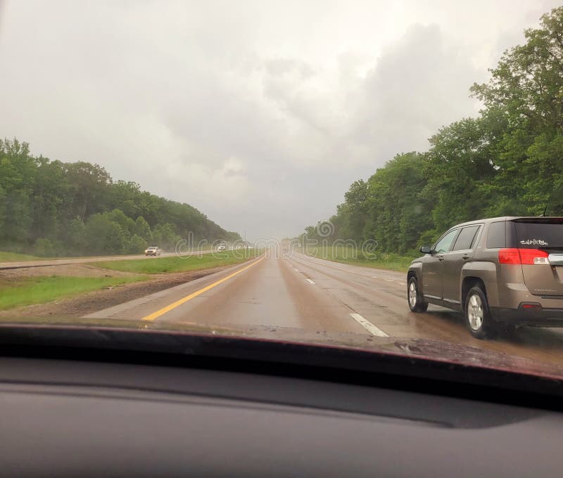 Driving during rainy day stock photo. Image of asphalt - 262313222