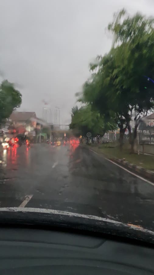 Driving on rainy day stock photo. Image of driving, mist - 270489264