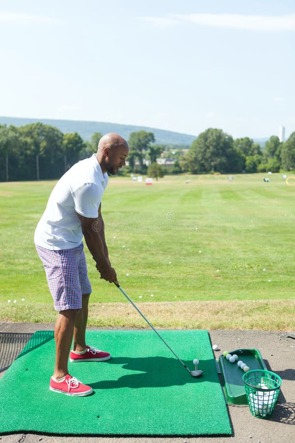 Driving Range Tee Off stock photo. Image of muscular - 48458376
