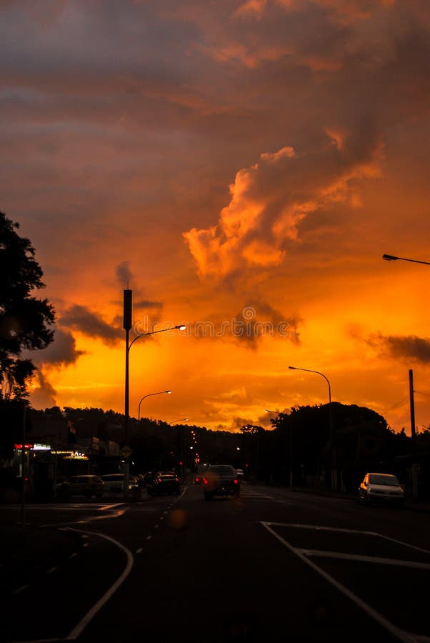Dramatic sunset over road editorial stock image. Image of path - 121258429