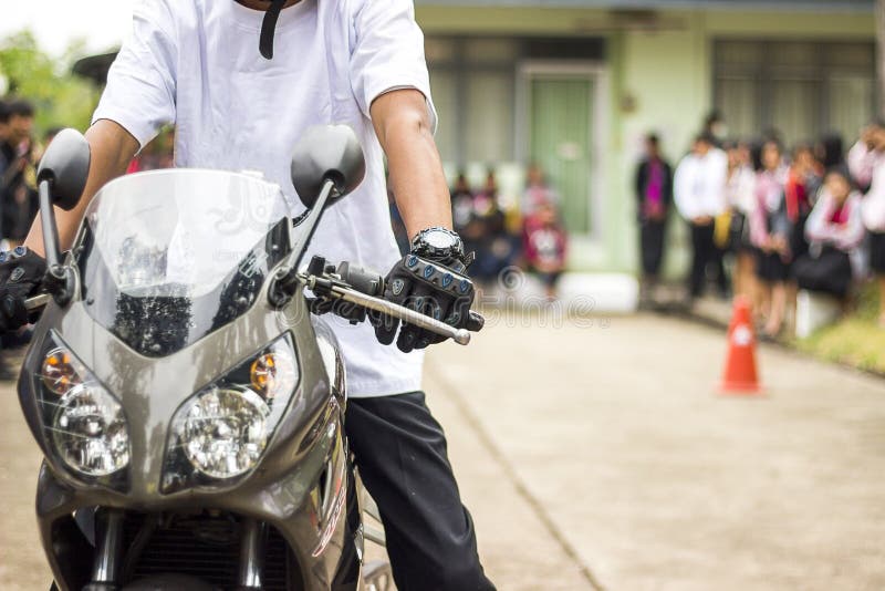 Driving a safe motorcycle. stock image. Image of people - 107517577