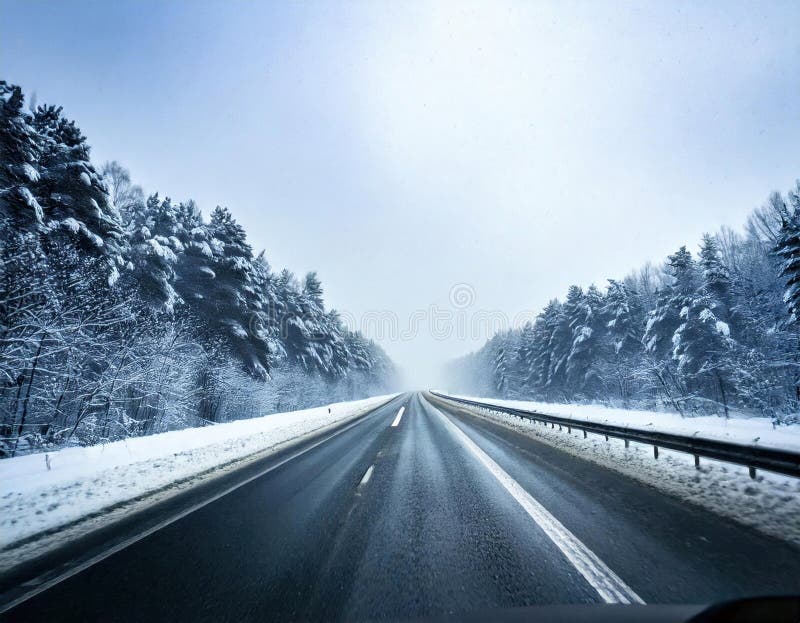 Driving through Snow in the Highway in Winter Weather Stock ...