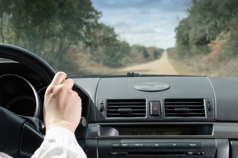 Man driving car on road stock photo. Image of wave, salute - 34782940