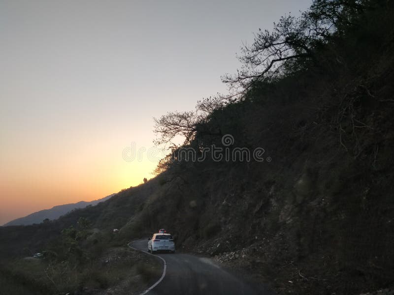 Driving into the sunset stock image. Image of road, driving - 169437953