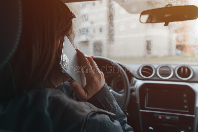 Driving and talking stock photo. Image of phone, communications - 687528