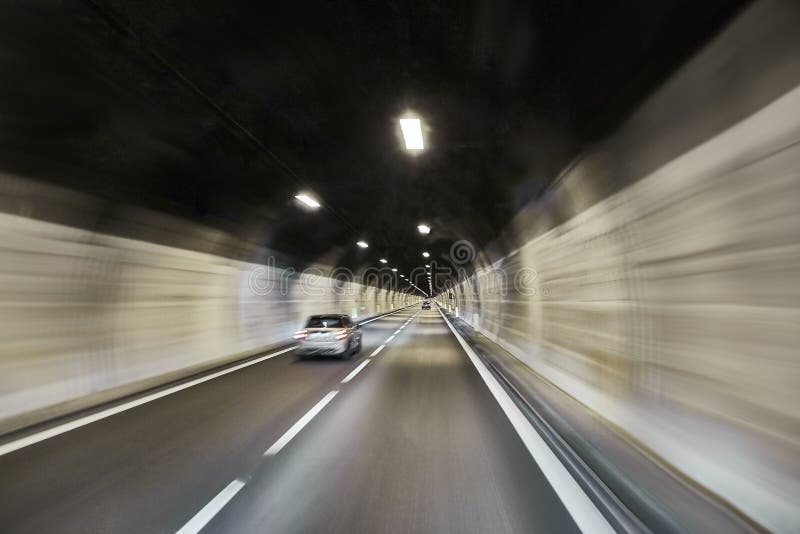 Driving in a tunnel stock image. Image of main, motionblurred - 161529029