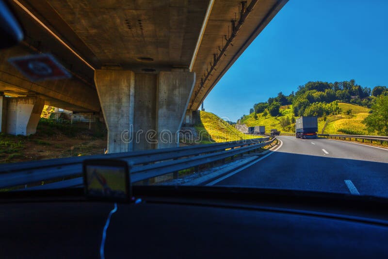 Driving under the bridge stock photo. Image of drivers - 132146806