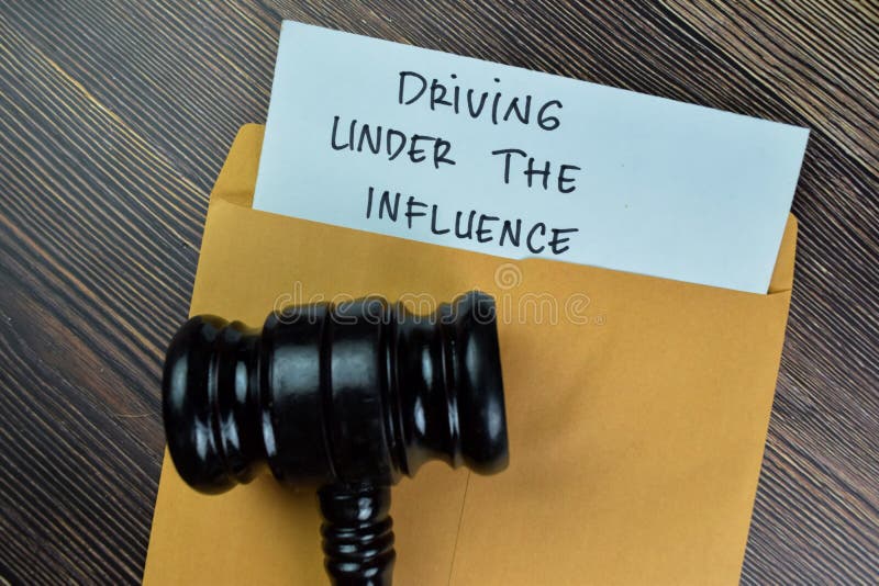 Driving Under the Influence Text on Document with Gavel Above Brown ...