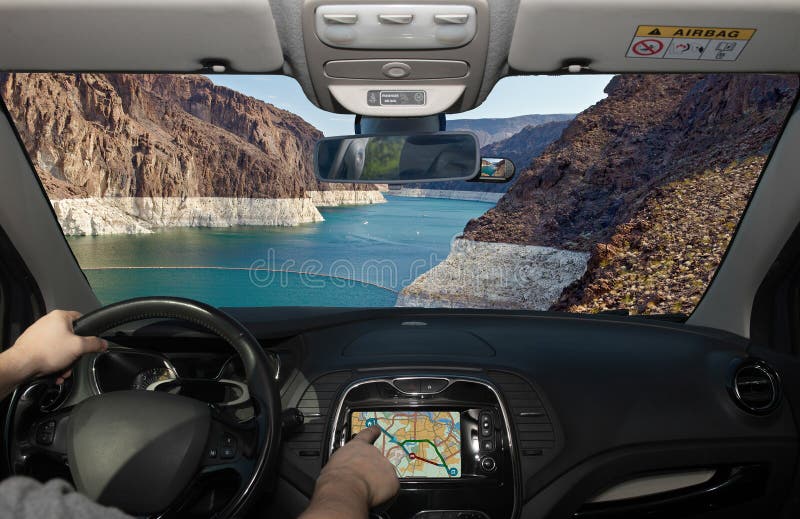 Driving Using GPS with View of Colorado River, Nevada, USA Stock Photo ...