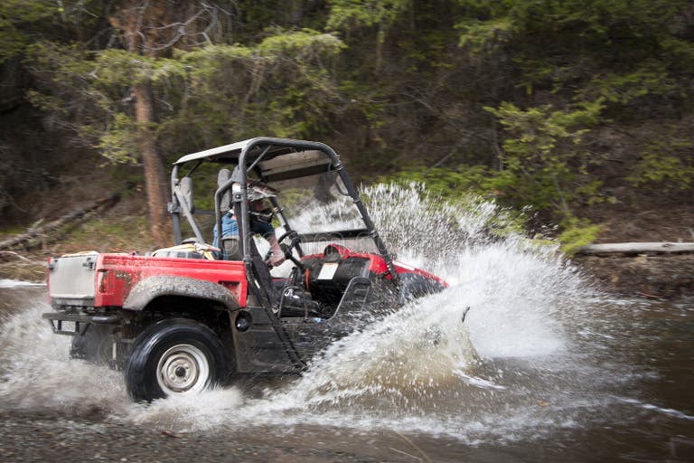 Driving UTV through Water Crossing Stock Image - Image of ...