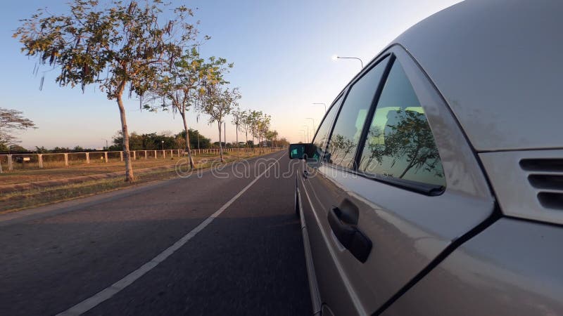 Driving View from Side View of the Car with Reflection on the Window ...