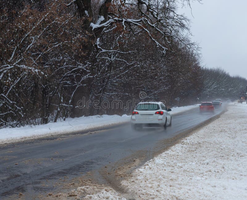 Driving in Winter after a Snowfall, Ice on the Road, Temperatures Below ...