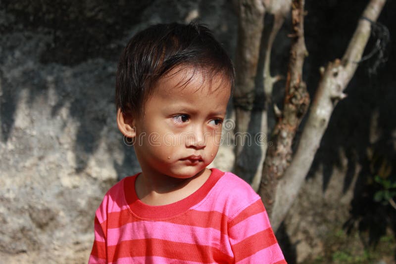 Droevig Little Boy stock foto. Image of kinderen, azië - 23552434