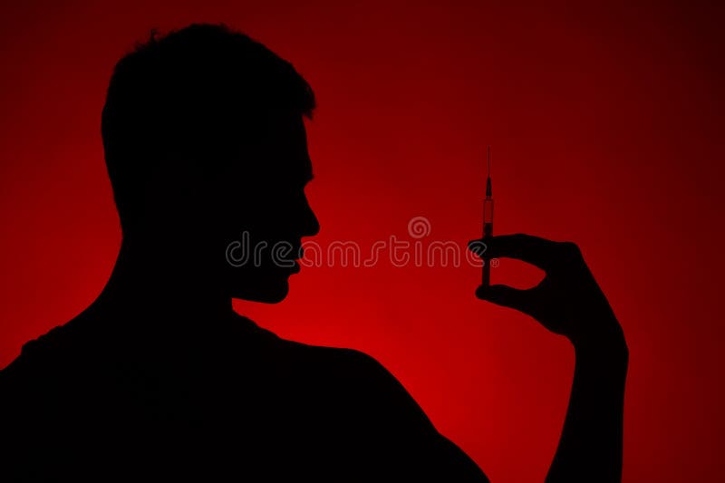 Drogadicto Que Se Coloca En Fondo Rojo Foto de archivo - Imagen de ...