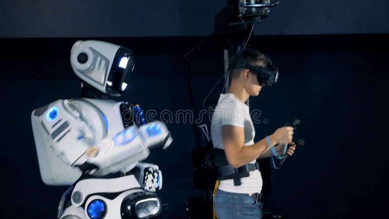 Robot and Gamer Moving in VR Glasses, Close Up. Stock Footage - Video ...