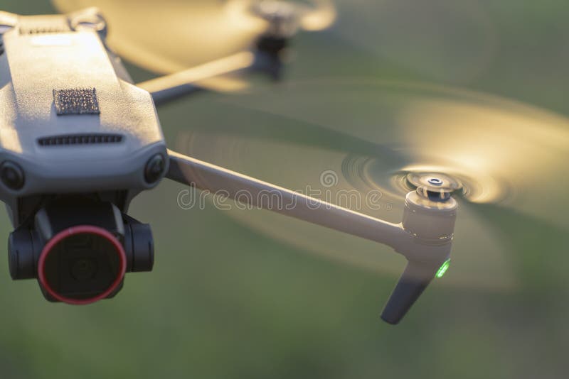 Drone Aircraft with Blurred Fast Rotating Propellers and Video Camera ...
