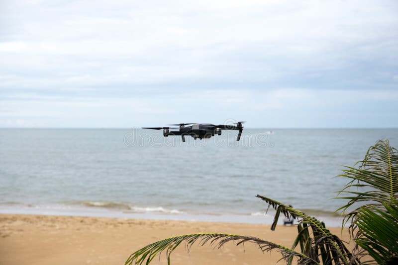 Drone with Camera Flying Over the Beach Stock Photo - Image of high ...