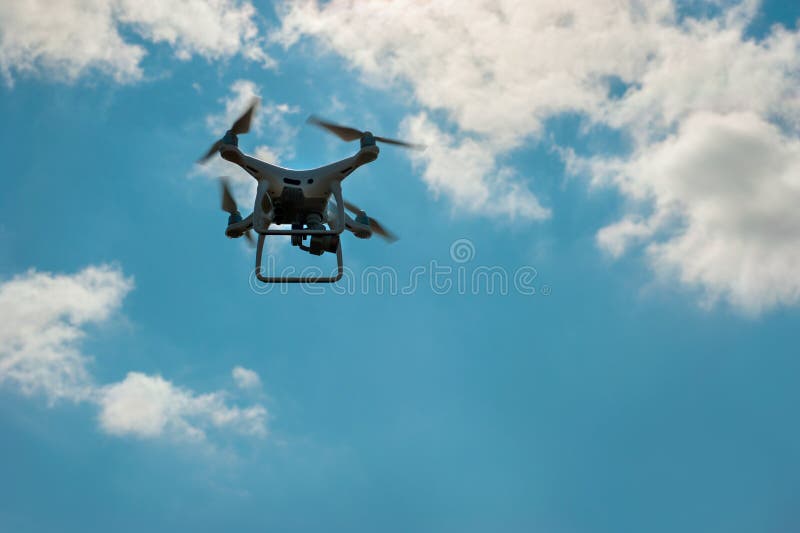 Drone with Camera Flying in the Sky, Shooting for Industry Stock Photo ...