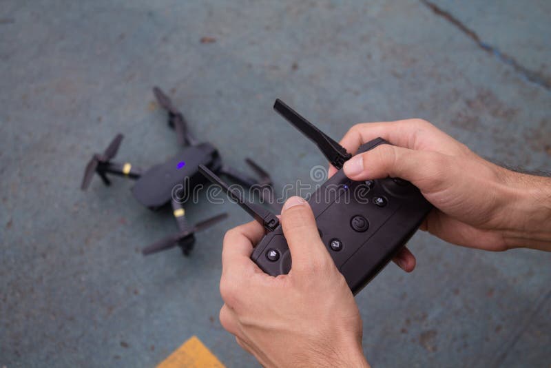 Drone control in hands stock photo. Image of filming - 196916392
