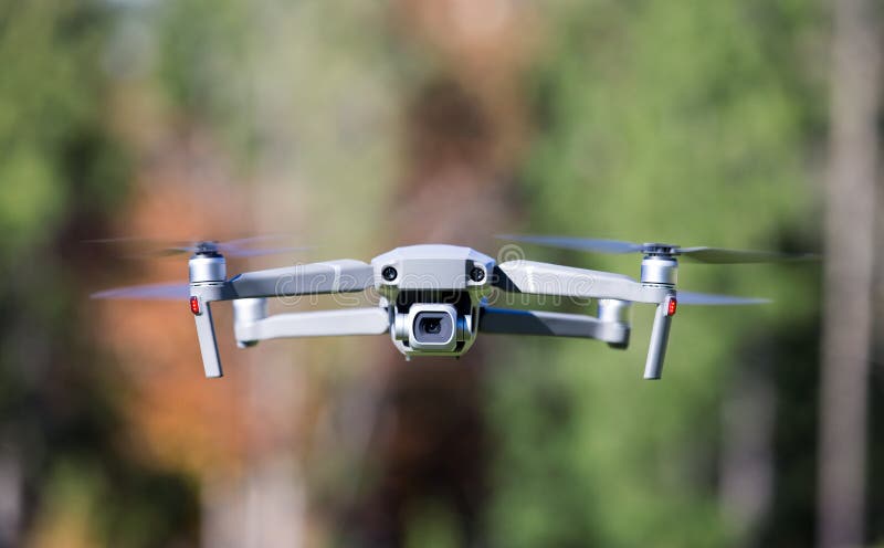 The drone copter flying stock image. Image of camera - 261944935