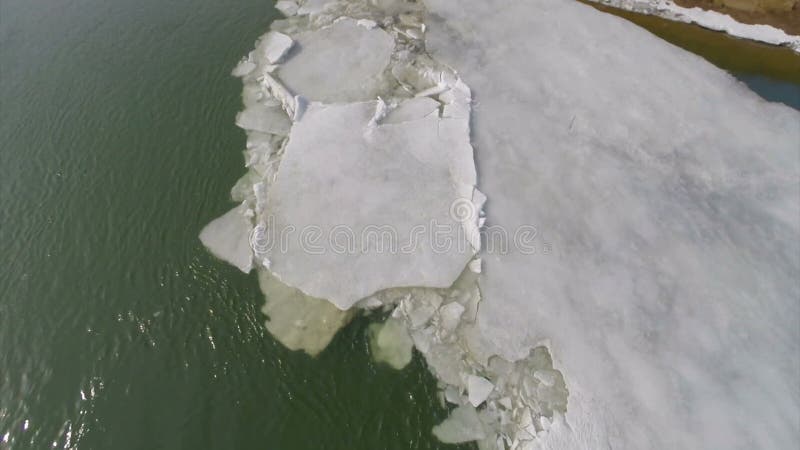 Drone Crash on Spring River with Floating Ice Stock Footage - Video of ...