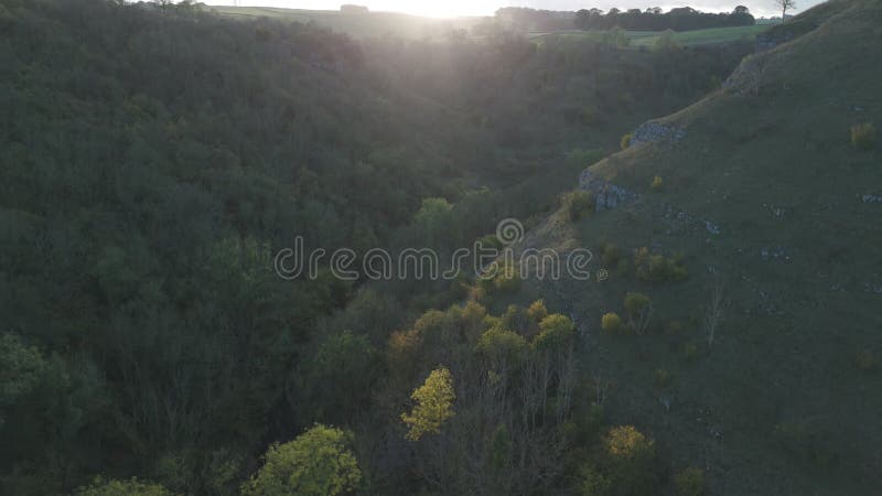 Drone Descending into Lathkill Dale Valley, Showcasing Greenery on ...