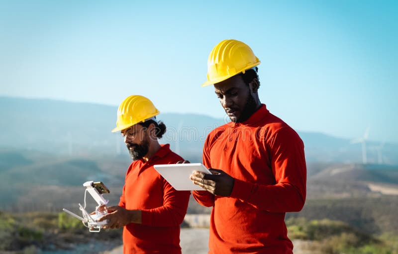 Drone Engineers Working on Wind Turbine Farm Stock Photo - Image of ...
